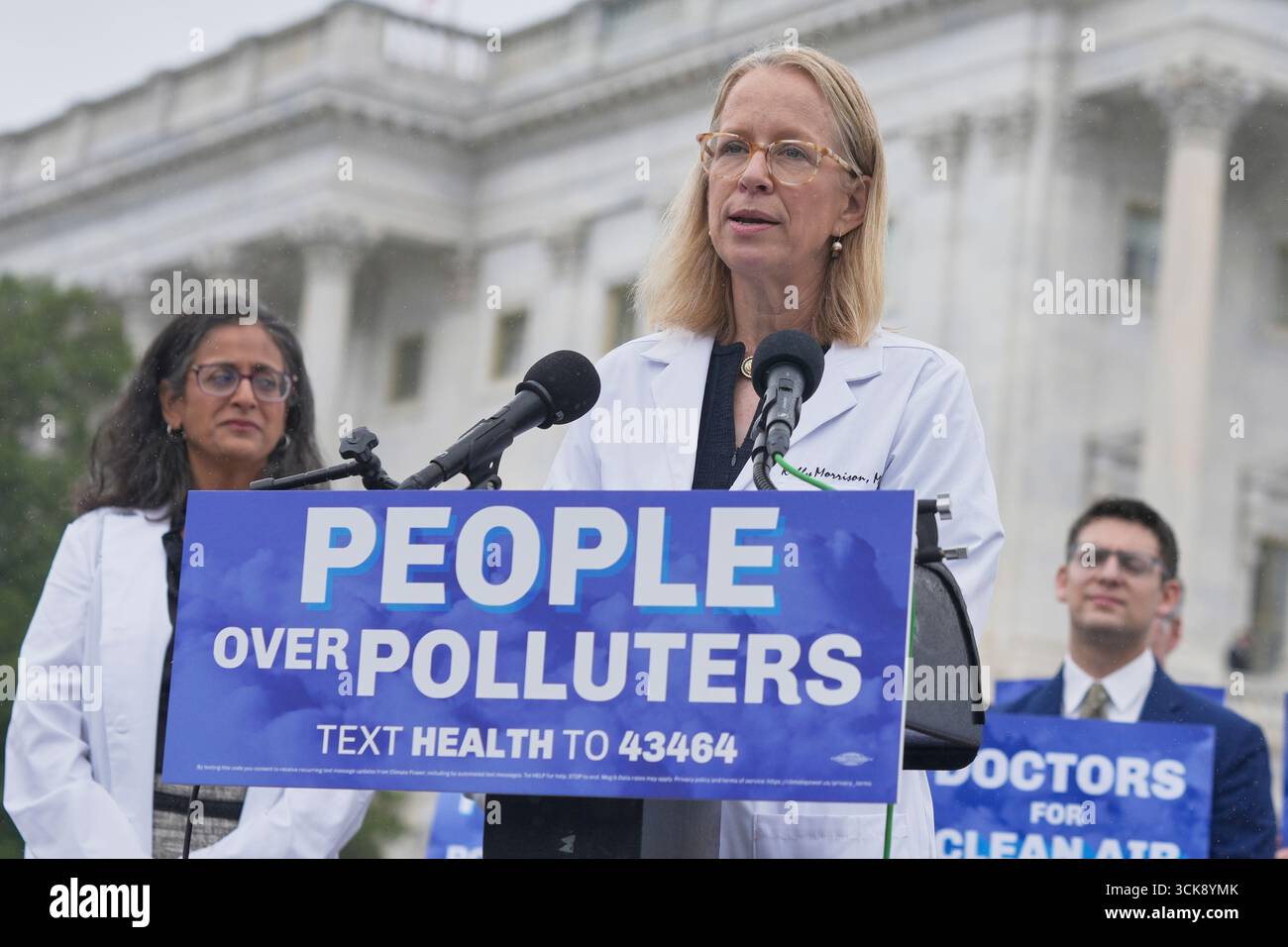 Rep. Kelly Morrison D-MN, center, speaks during a news conference on ...