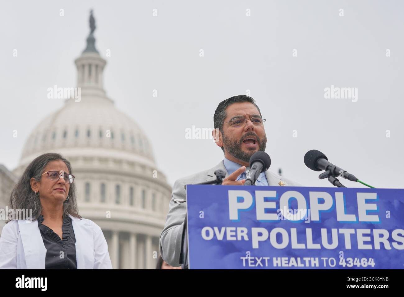 Rep. Raul Ruiz, D-Calif., right, speaks during a news conference on ...
