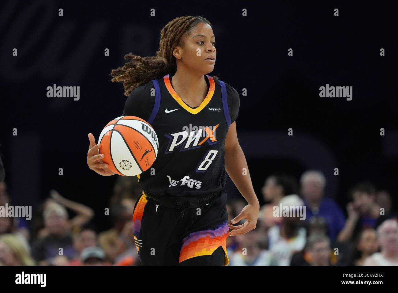 Phoenix Mercury guard Monique Akoa Makani dribbles the ball against the ...