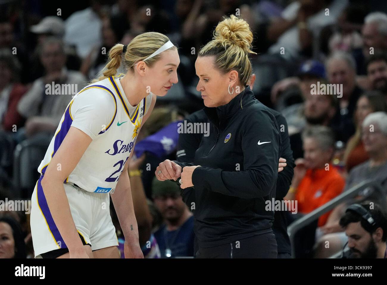 Los Angeles Sparks head coach Lynne Roberts, right, talks with Sparks ...