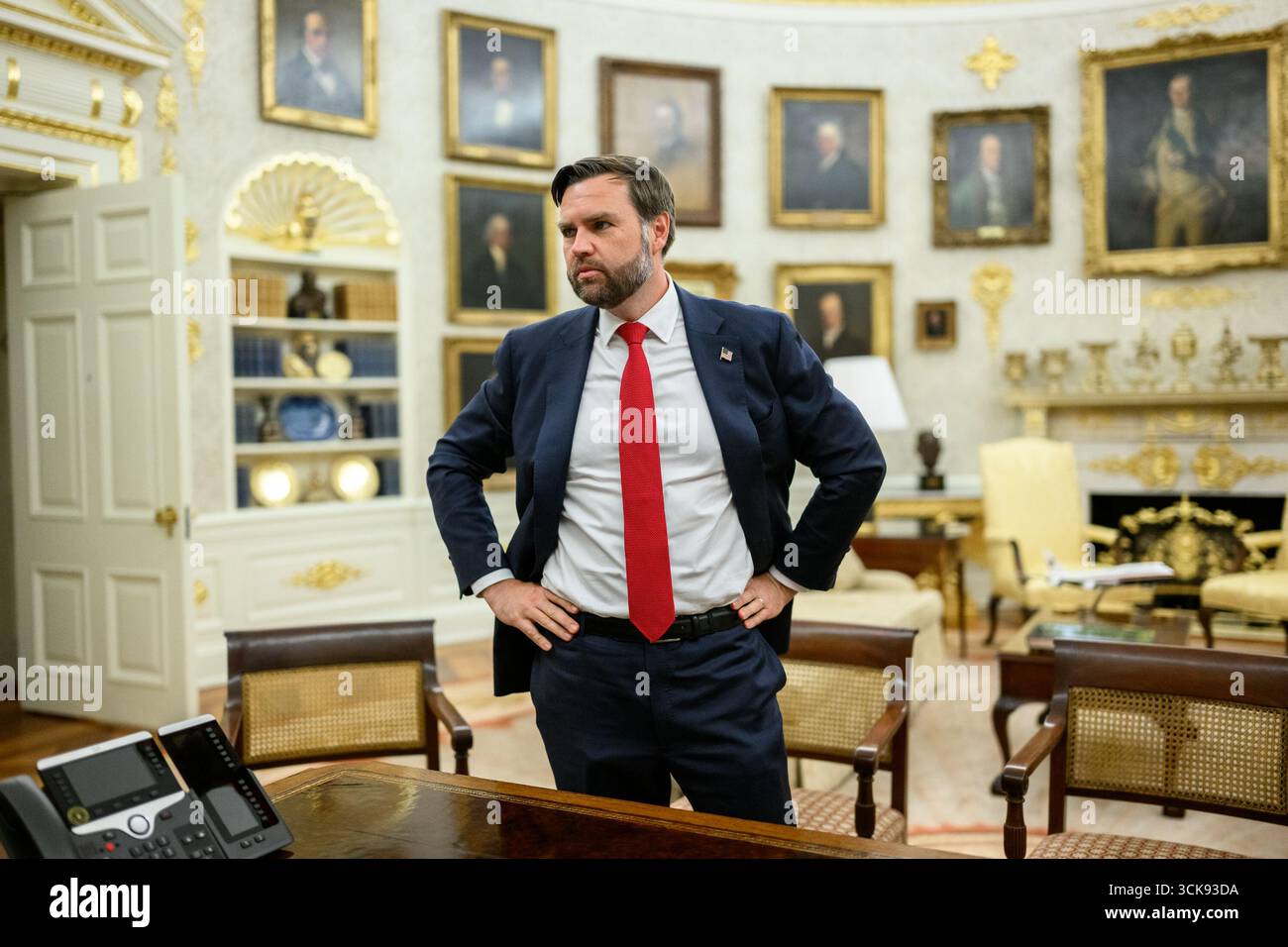 President Donald Trump speaks with Vice President JD Vance in the Oval ...