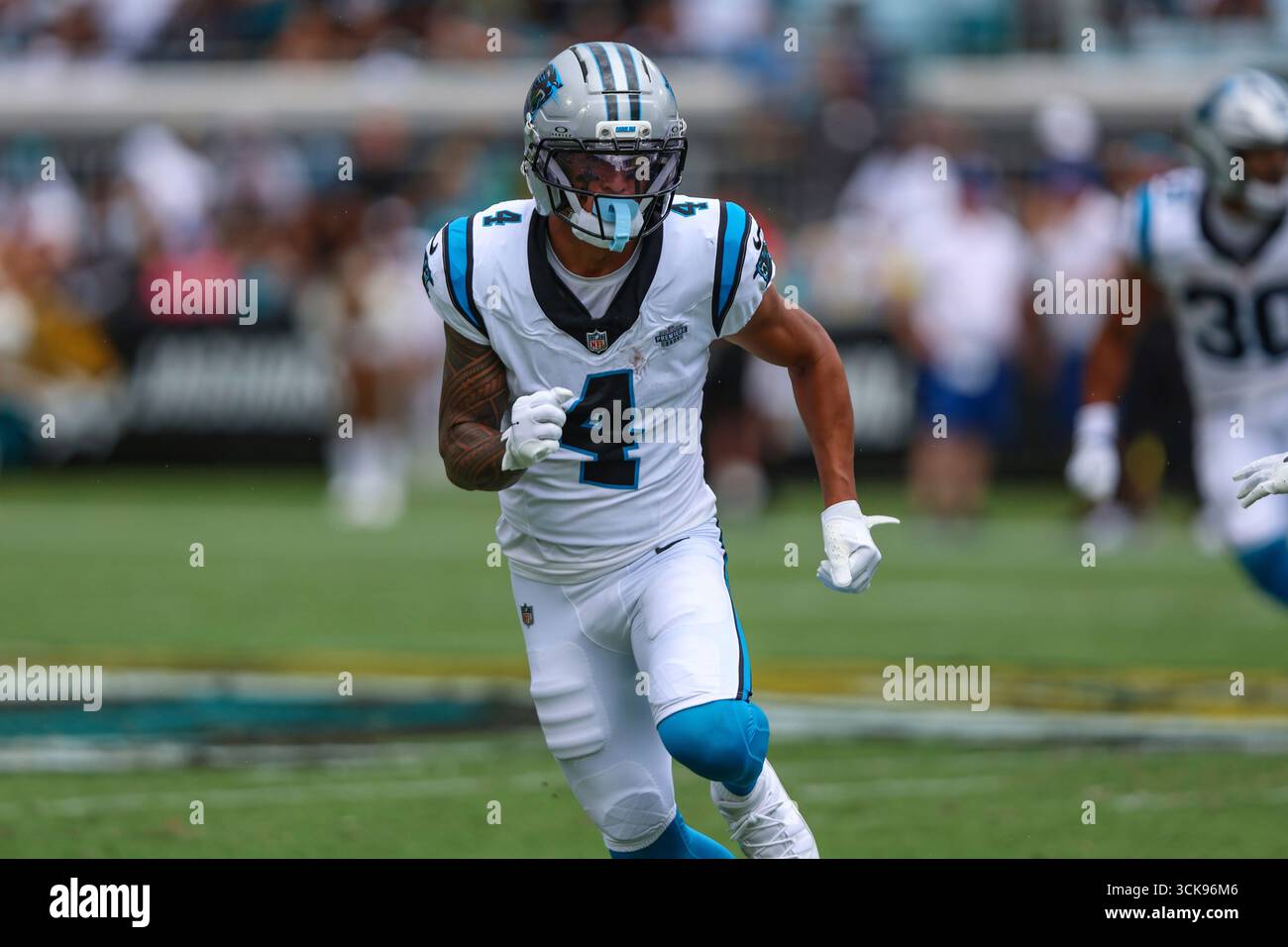 FILE - Carolina Panthers wide receiver Tetairoa McMillan (4) in action during an NFL football ...