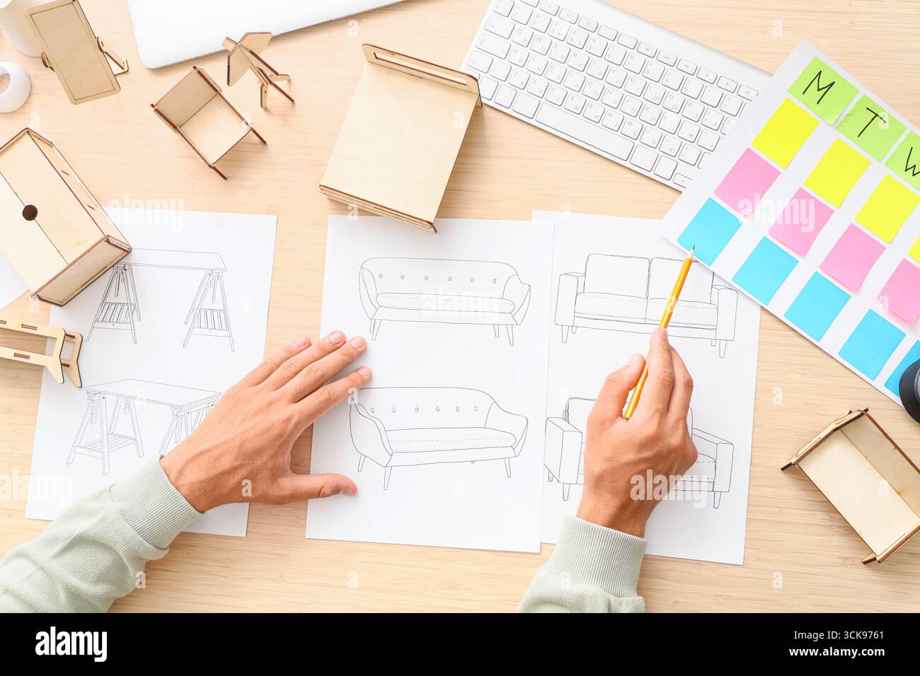 Male furniture designer drawings hi-res stock photography and images ...