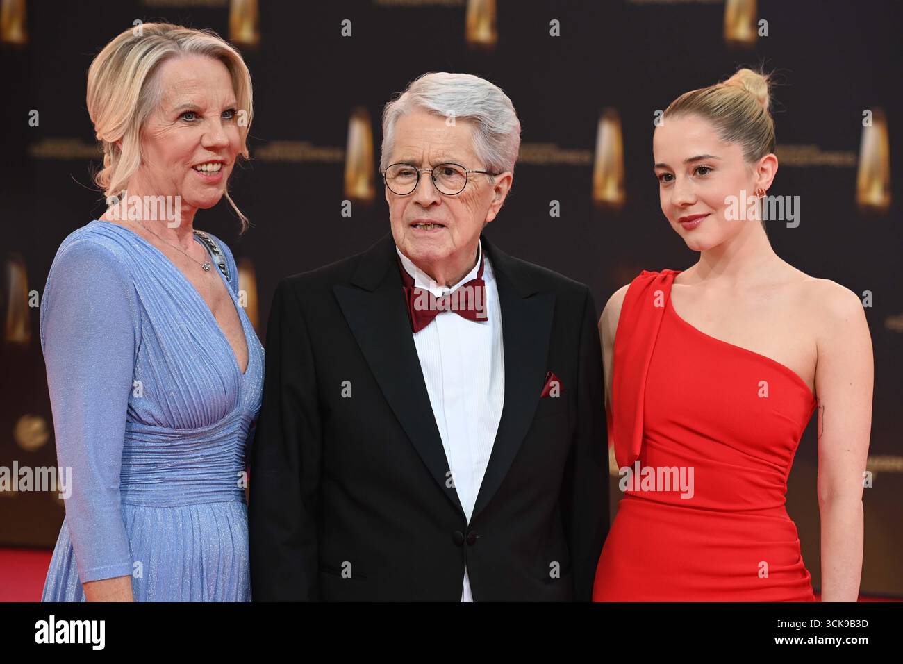 Frank ELOSTNER, showmaster, with wife Britta and daughter Enya, red ...