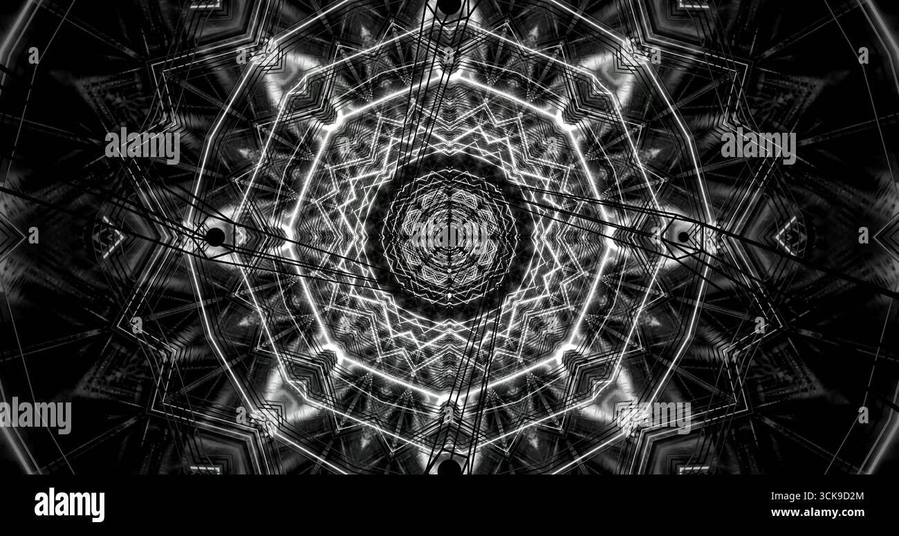 A complex black and white geometric pattern emerges, showcasing ...