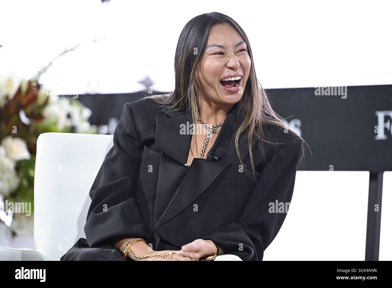 Lucy Guo, Founder & CEO, Passes, speaks at the Forbes Power Women's ...