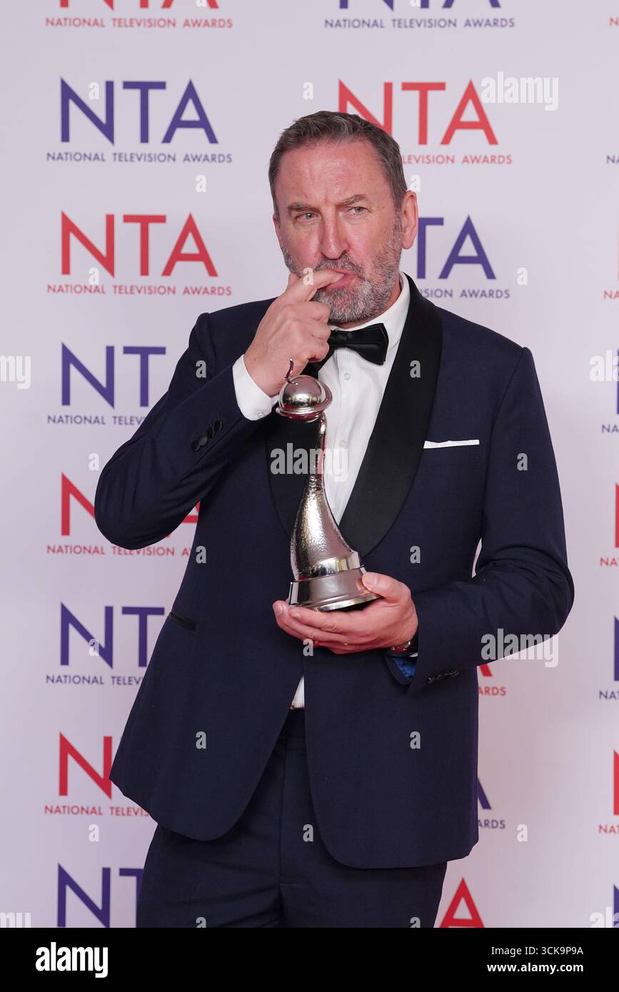 Lee Mack in the press room after winning the Quiz Game Show Award for ...