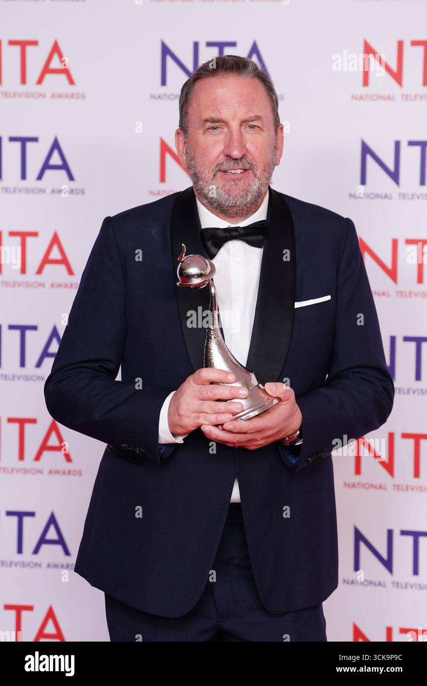Lee Mack in the press room after winning the Quiz Game Show Award for ...