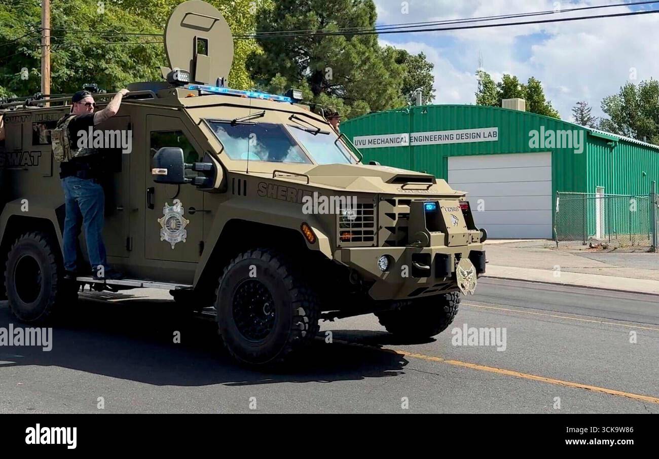 In this image taken from video, SWAT heads into campus after Charlie ...
