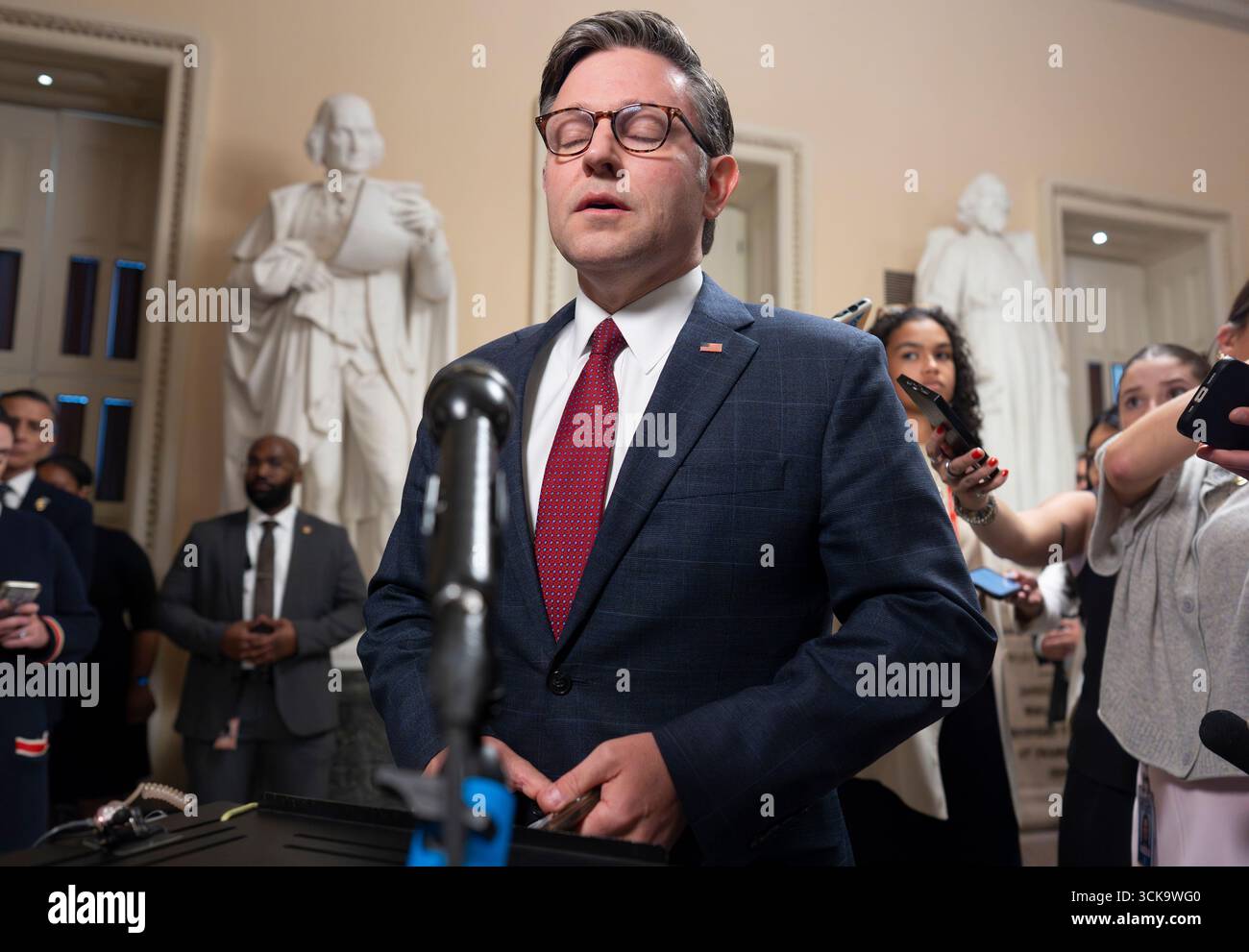 Speaker of the House Mike Johnson, R-La., pauses as he talks to ...