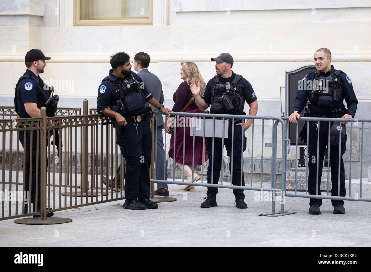 U.S. Capitol Police officers guard an entrance to the U.S. Capitol ...
