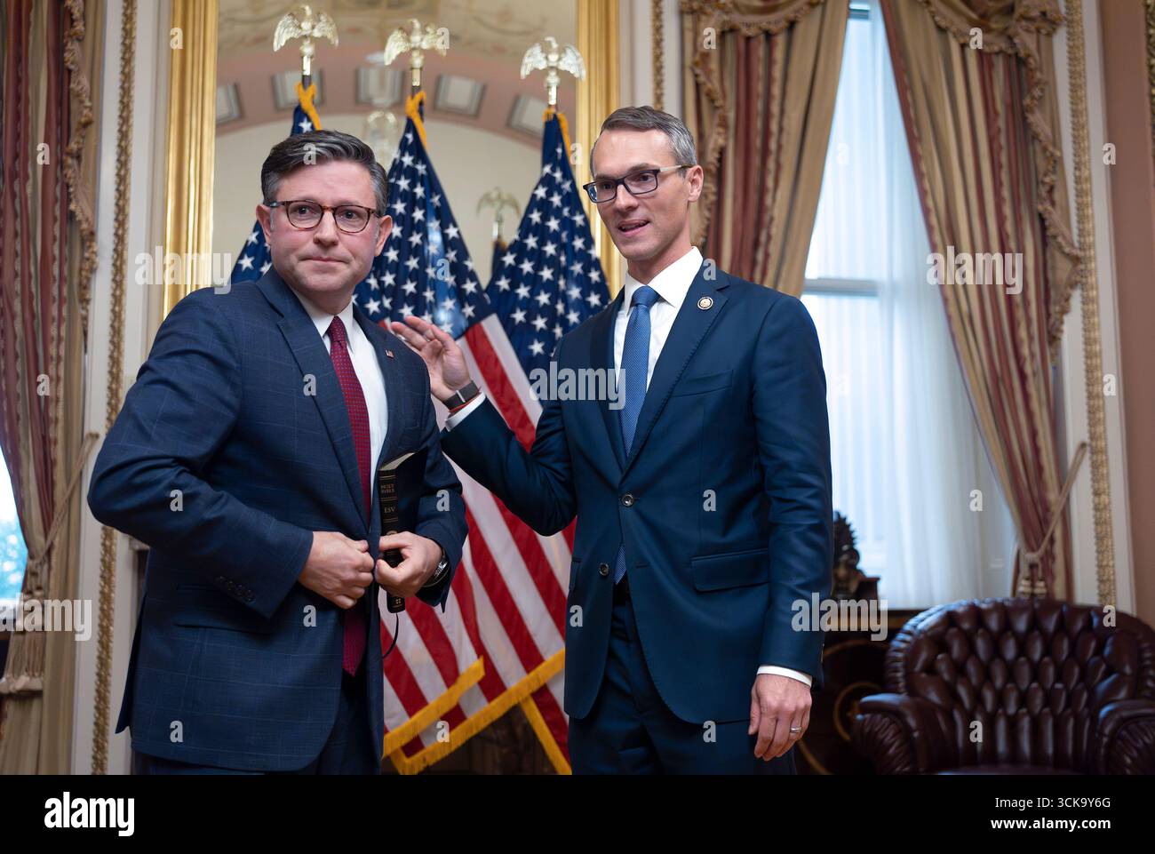 Speaker of the House Mike Johnson, R-La., left, arrives for a swearing ...