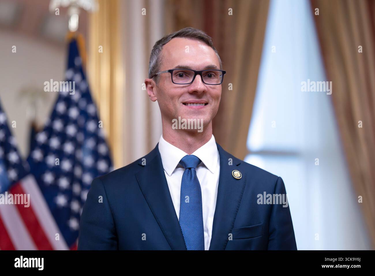 Newly-elected Rep. James Walkinshaw, D-Va., smiles after a swearing-in ...