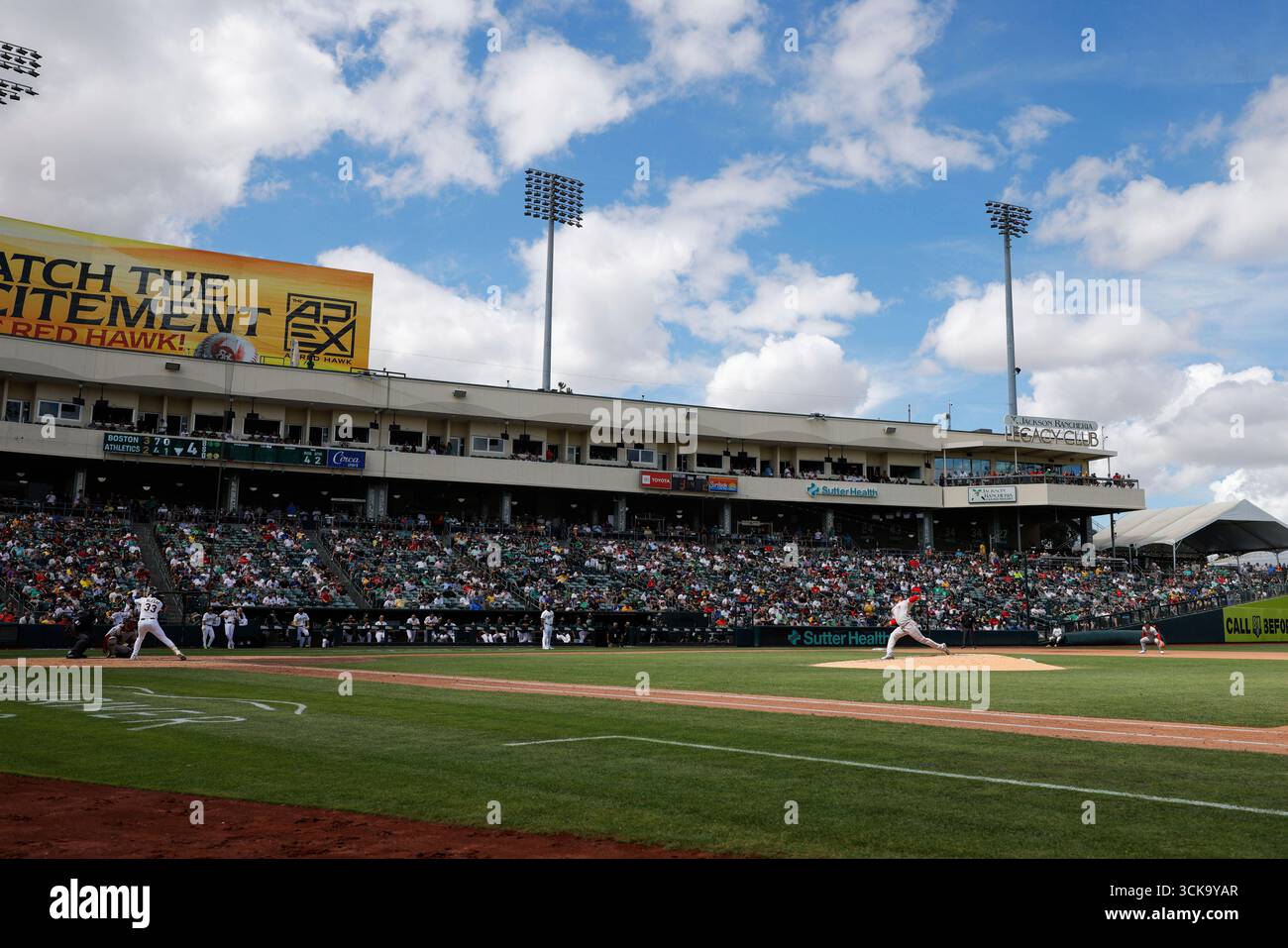 Boston Red Sox pitcher Justin Wilson throws to an Athletics batter ...