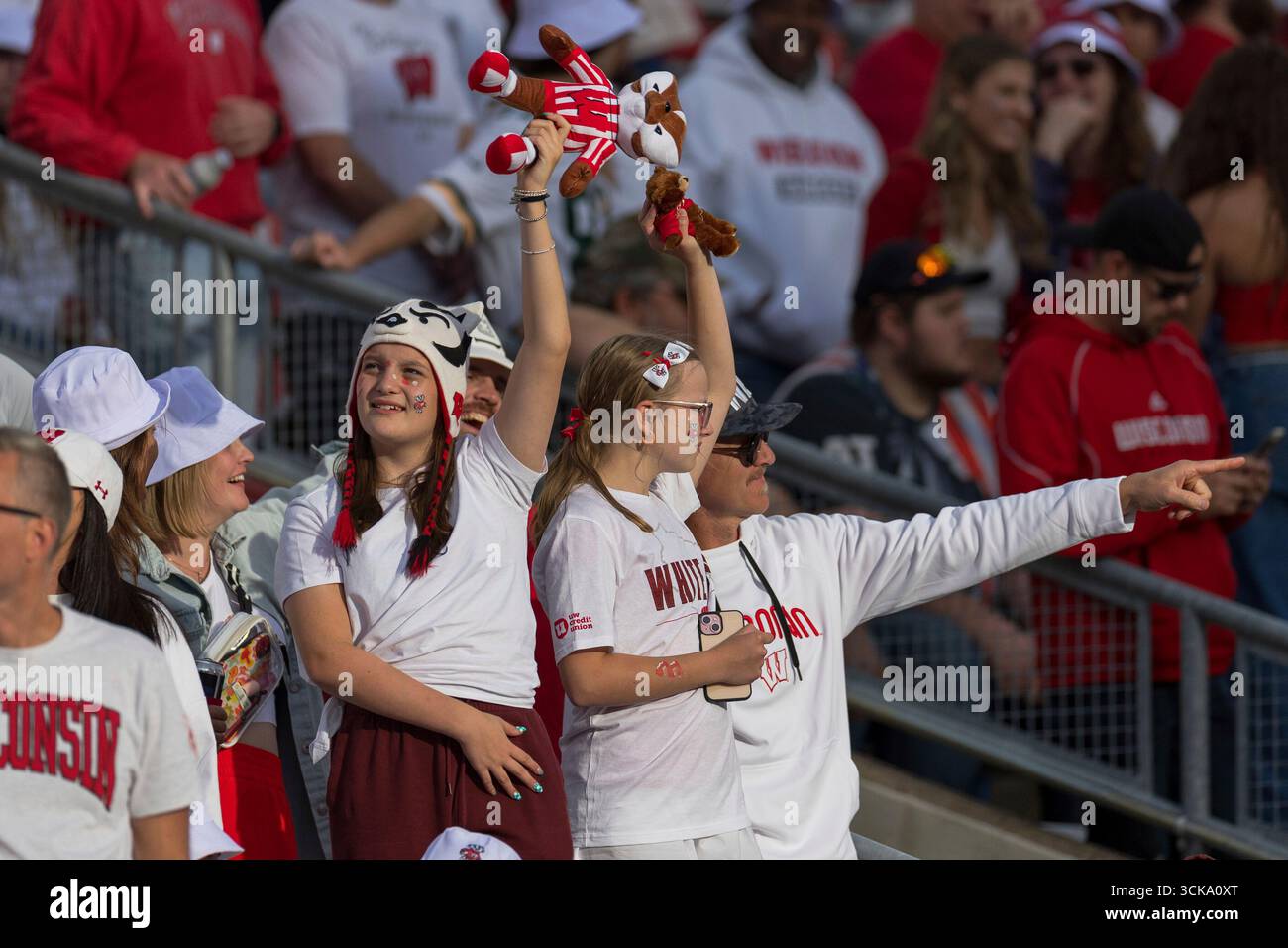 MADISON, WI - SEPTEMBER 06: Wisconsin Badger Fans wave Bucky Badger ...
