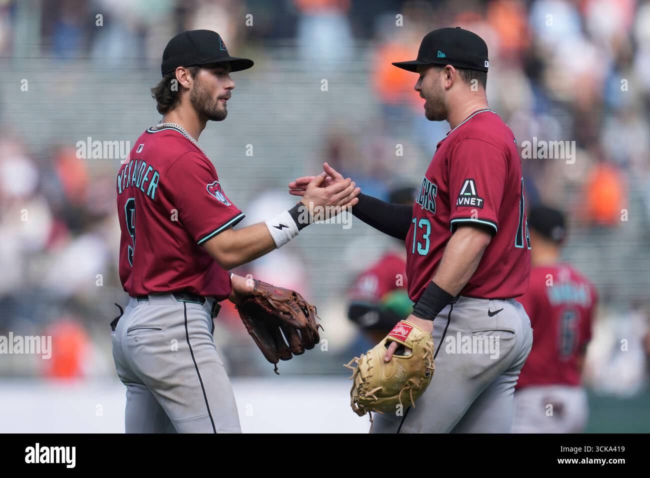 Arizona Diamondbacks' Blaze Alexander, left, celebrates with Tim Tawa ...