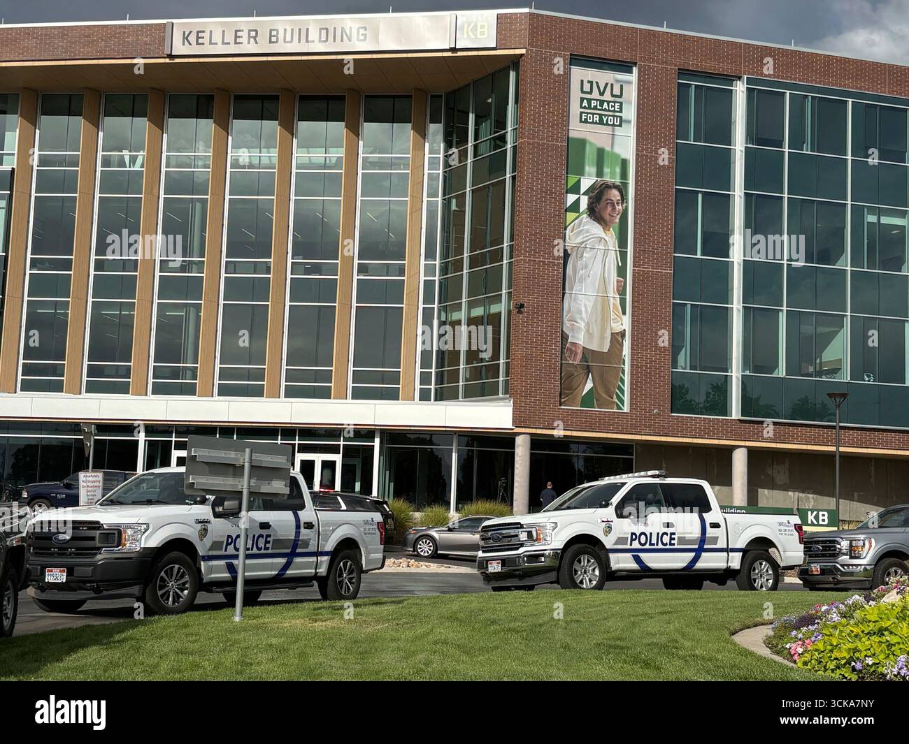 Police vehicles are parked at the Keller Building on the Utah Valley ...