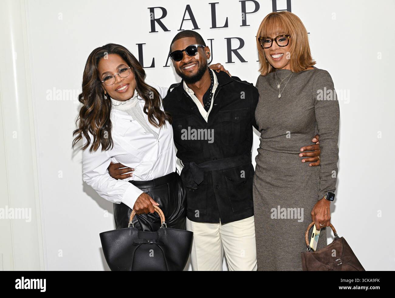 From left, Oprah Winfrey, Usher and Gayle King attend the Ralph Lauren ...