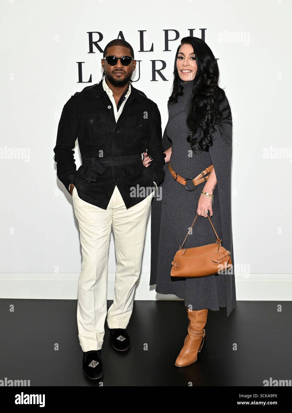 Usher, left, and Jennifer Goicoechea attend the Ralph Lauren Spring ...