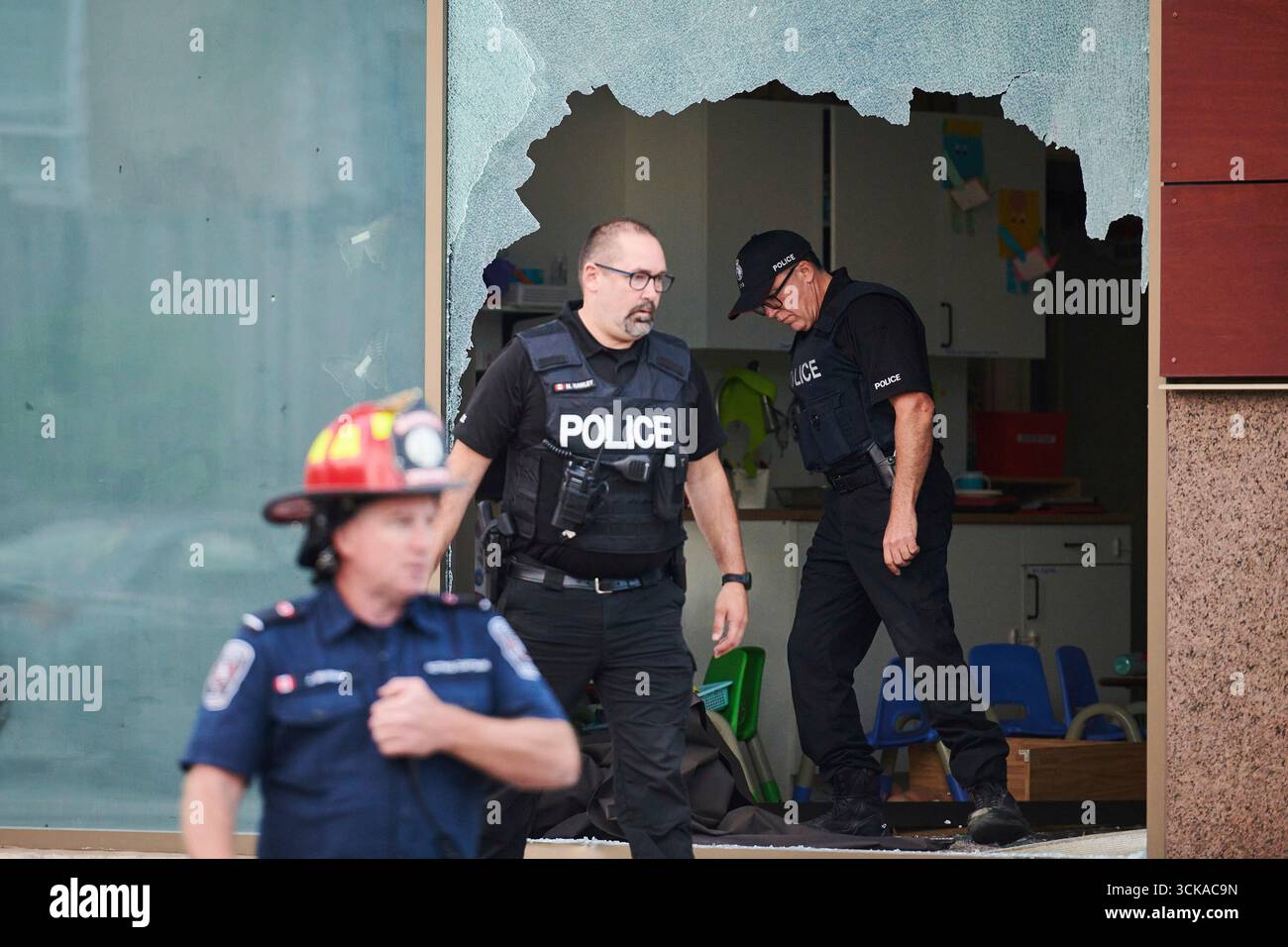 Police and fire crews assess the damage at First Roots Early Education ...