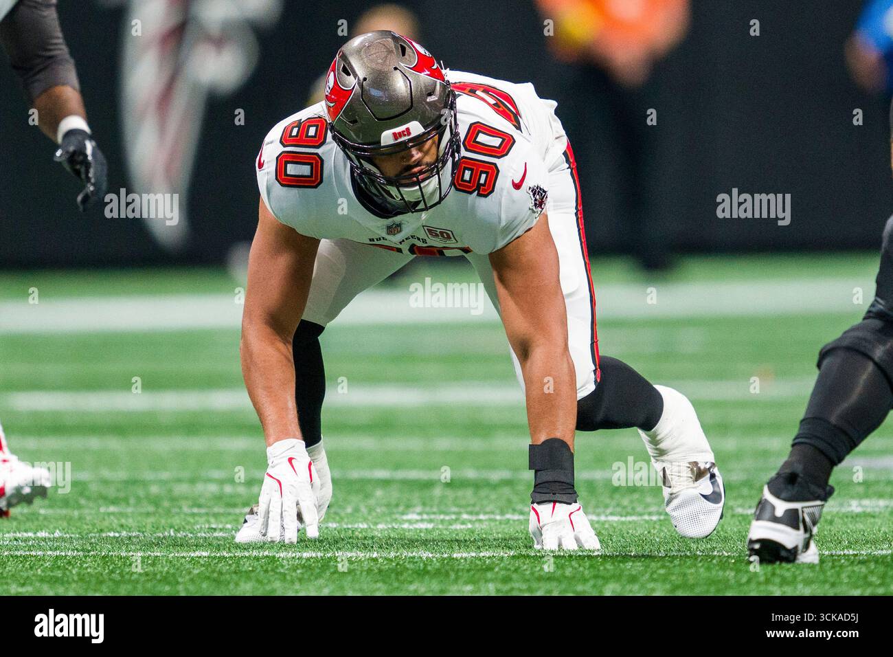 Tampa Bay Buccaneers defensive end Logan Hall (90) lines up during the first half of an NFL ...
