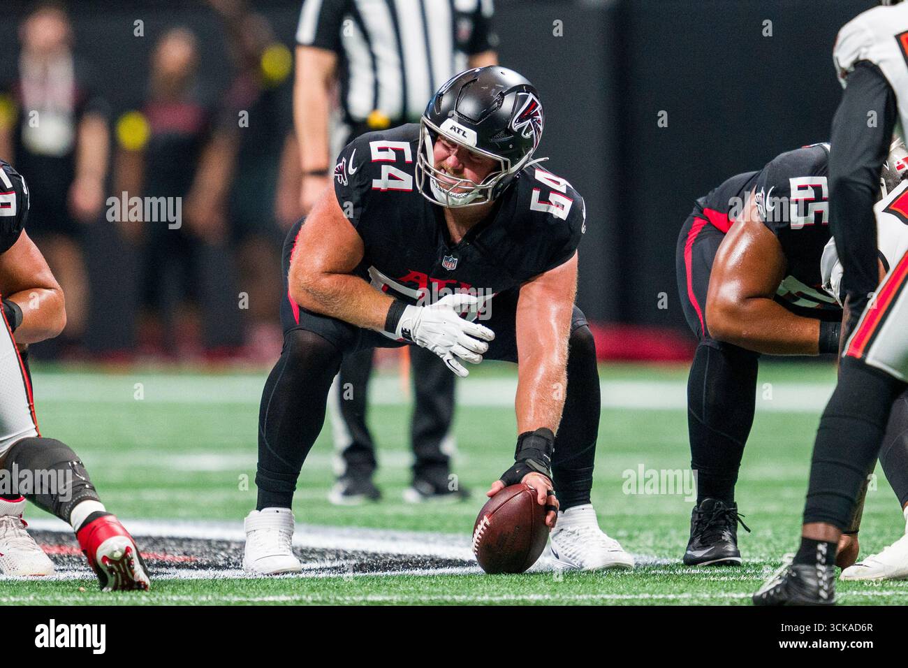 Atlanta Falcons guard Ryan Neuzil (64) lines up during the first half ...