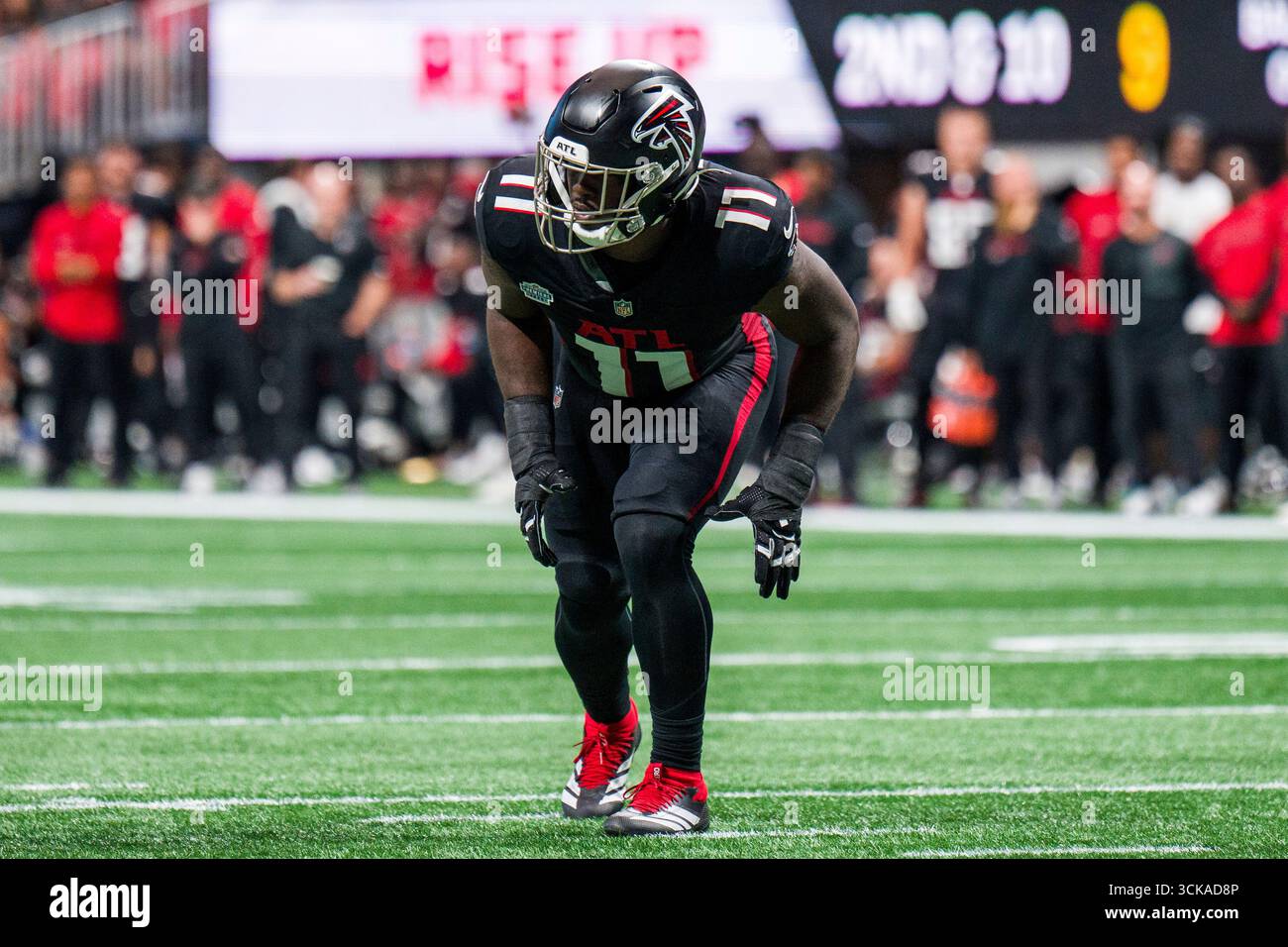 Atlanta Falcons linebacker Jalon Walker (11) lines up during the first ...