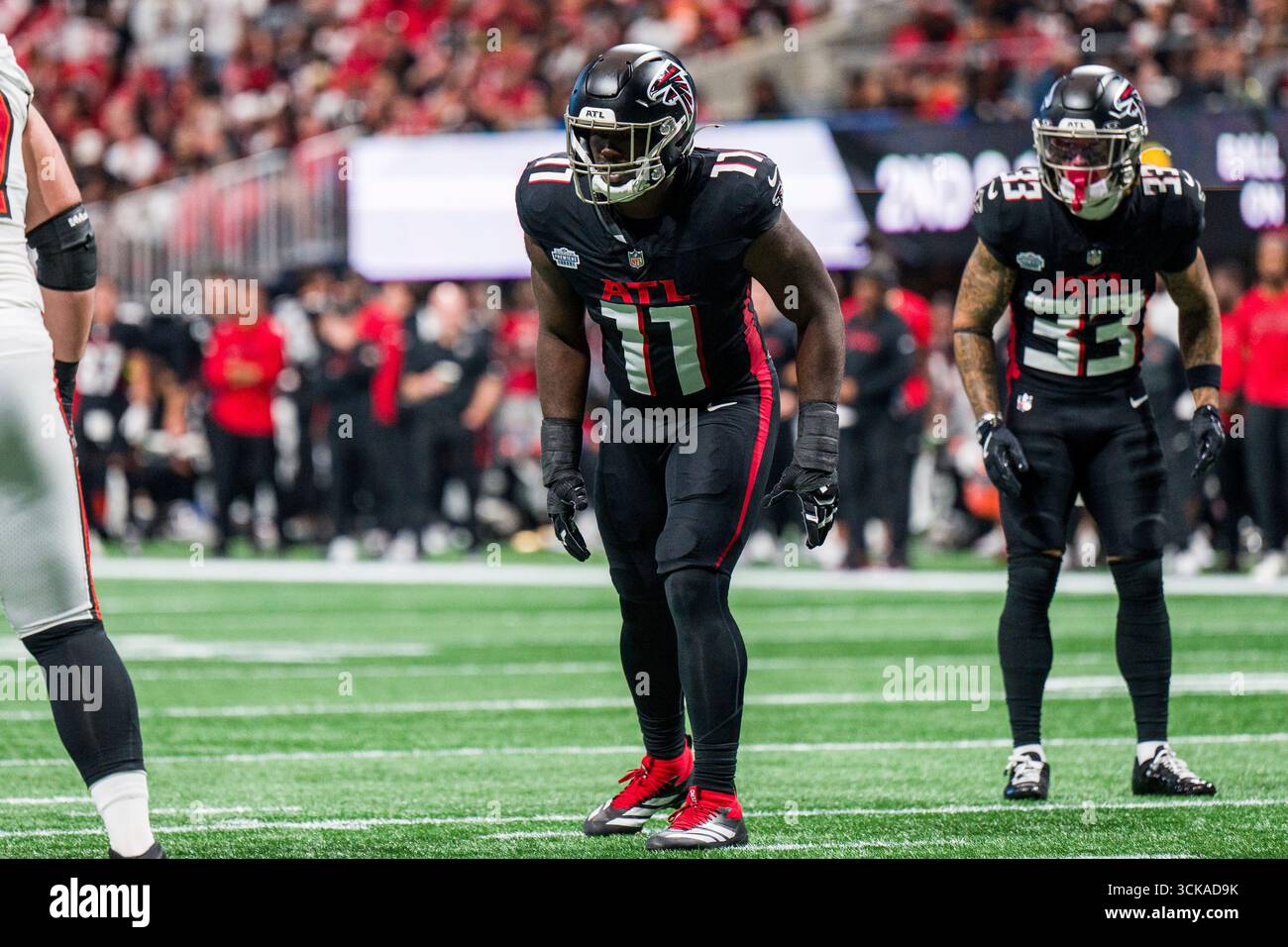 Atlanta Falcons linebacker Jalon Walker (11) lines up during the first ...