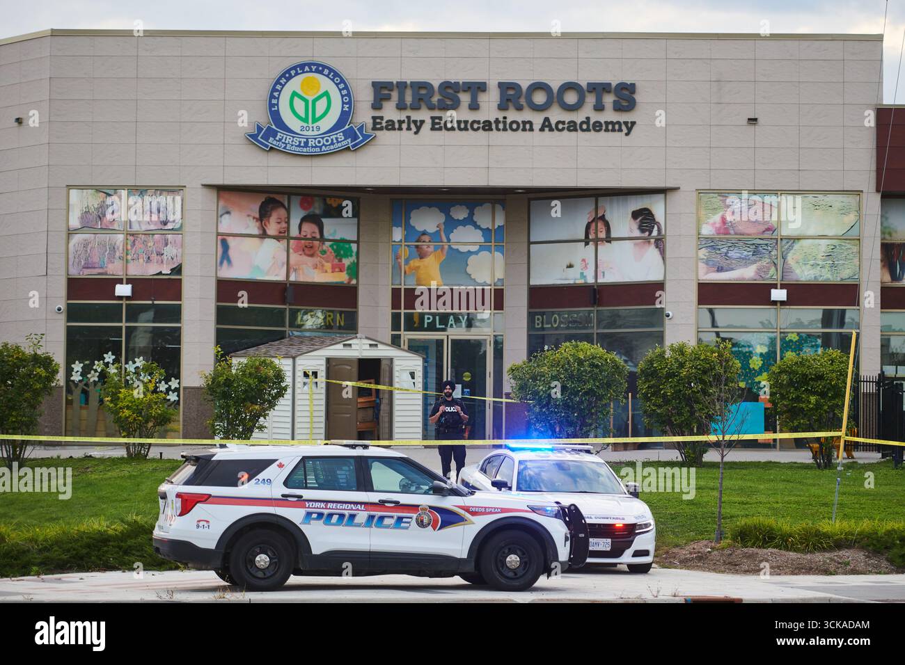 Police block off First Roots Early Education Academy after a car drove through its window in ...
