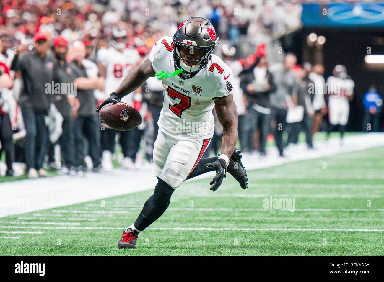 Tampa Bay Buccaneers running back Bucky Irving (7) runs the ball ...