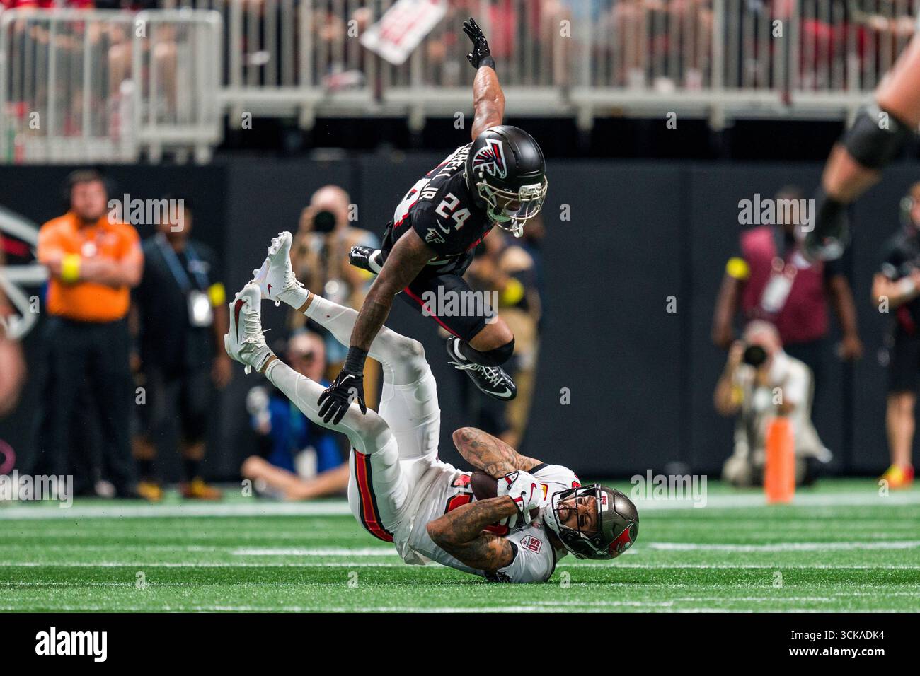 Atlanta Falcons cornerback A.J. Terrell Jr. (24) leaps over Tampa Bay ...