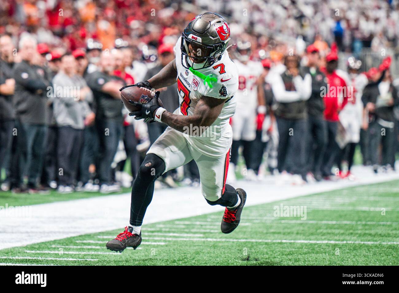 Tampa Bay Buccaneers running back Bucky Irving (7) runs the ball ...