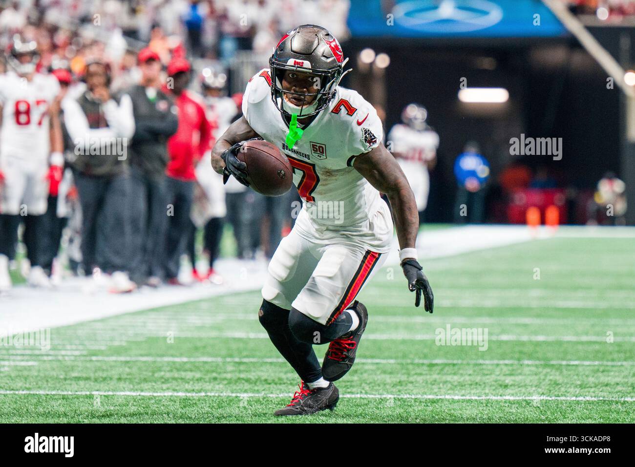 Tampa Bay Buccaneers running back Bucky Irving (7) runs the ball ...