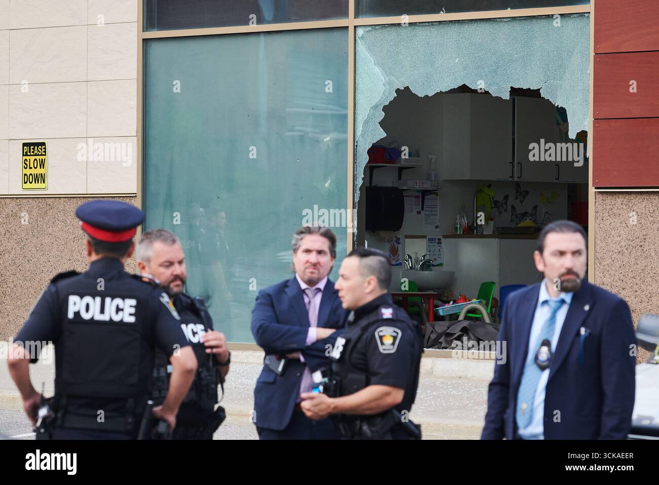 Police block off First Roots Early Education Academy after a car drove ...