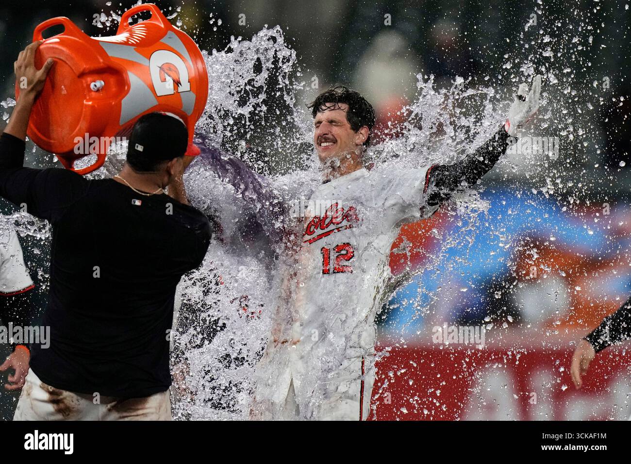 Baltimore Orioles' Dylan Beavers (12) is doused after hitting a walk ...