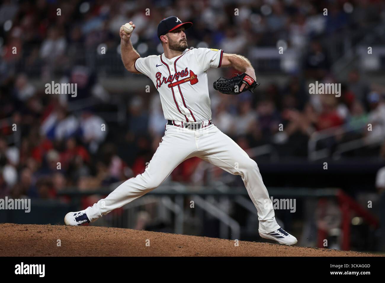 Atlanta Braves pitcher Tyler Kinley delivers in the seventh inning of a ...