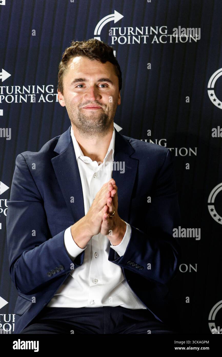 Conservative activist Charlie Kirk speaks during a town hall Monday ...