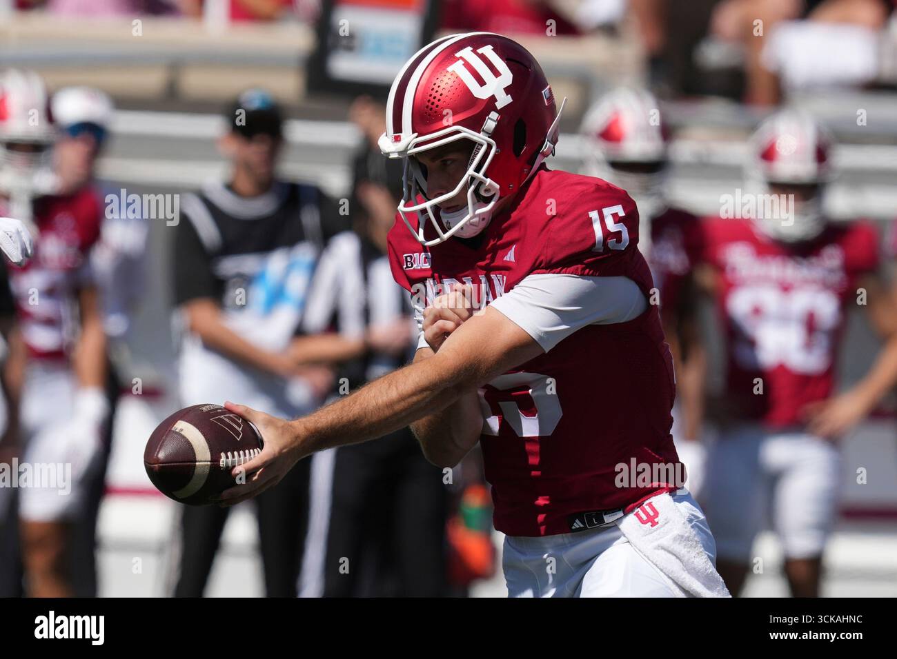 Indiana quarterback Fernando Mendoza hands off during the first half of ...