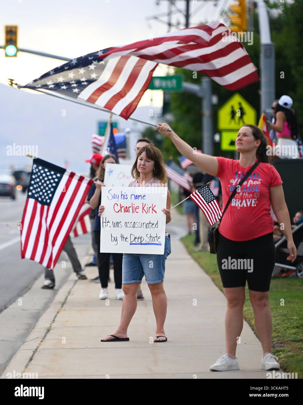People outside at Timpanogos Regional Hospital attend a vigil for ...