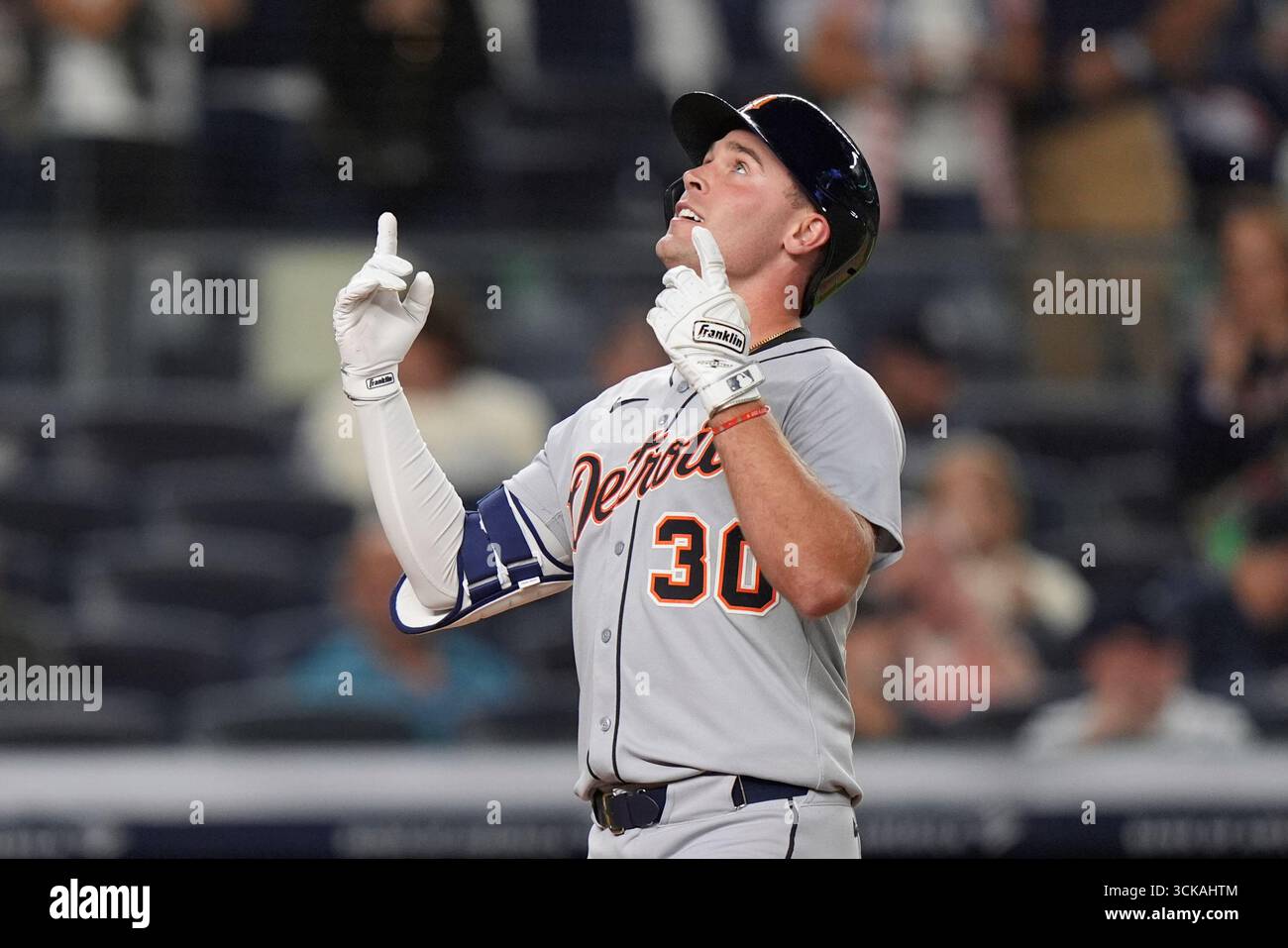 Detroit Tigers' Kerry Carpenter (30) smiles as he reaches home plate ...