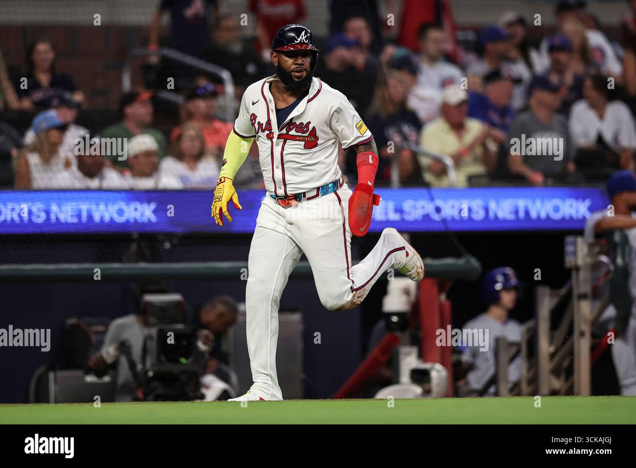 Atlanta Braves' Marcell Ozuna runs home in the third inning of a ...
