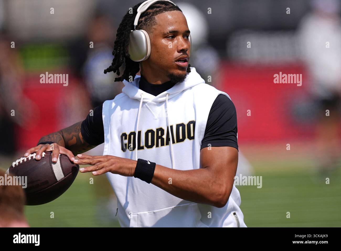 Colorado quarterback Kaidon Salter (3) warms up before an NCAA college ...