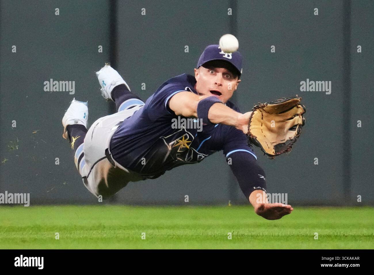 Tampa Bay Rays center fielder Jake Mangum makes a diving catch on a fly ...