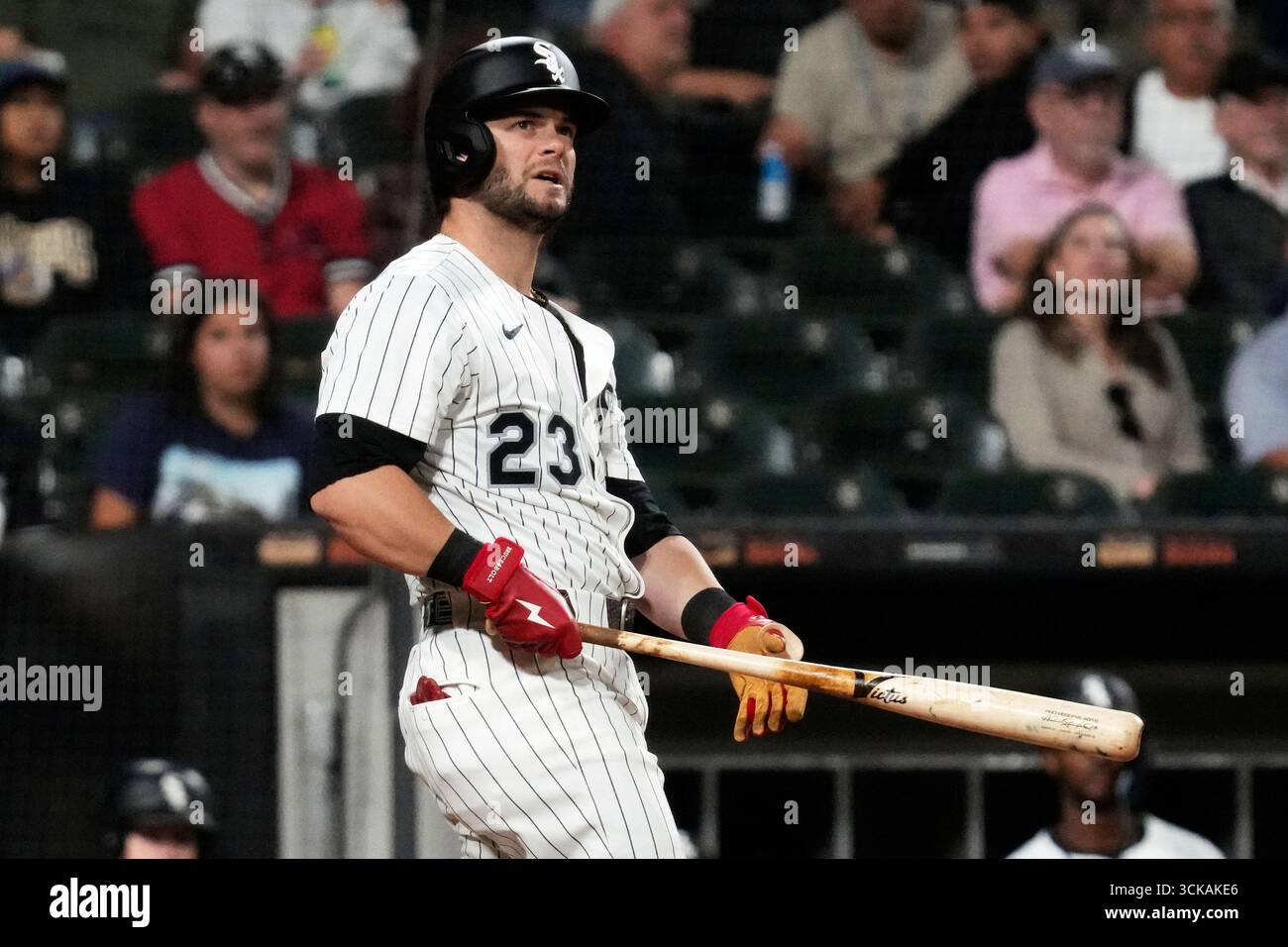 Chicago White Sox's Andrew Benintendi watches after hitting a foul ball during the eighth inning ...