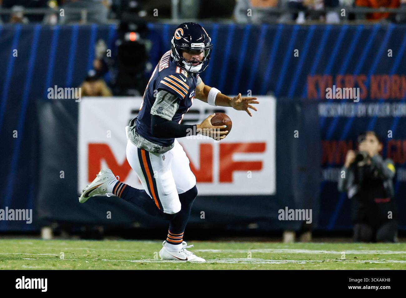 Chicago Bears quarterback Caleb Williams (18) runs with the ball during ...