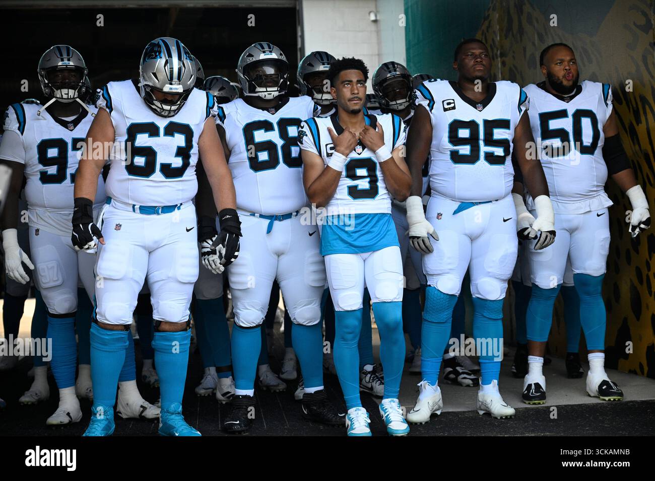 Carolina Panthers quarterback Bryce Young (9) stands with center Austin ...