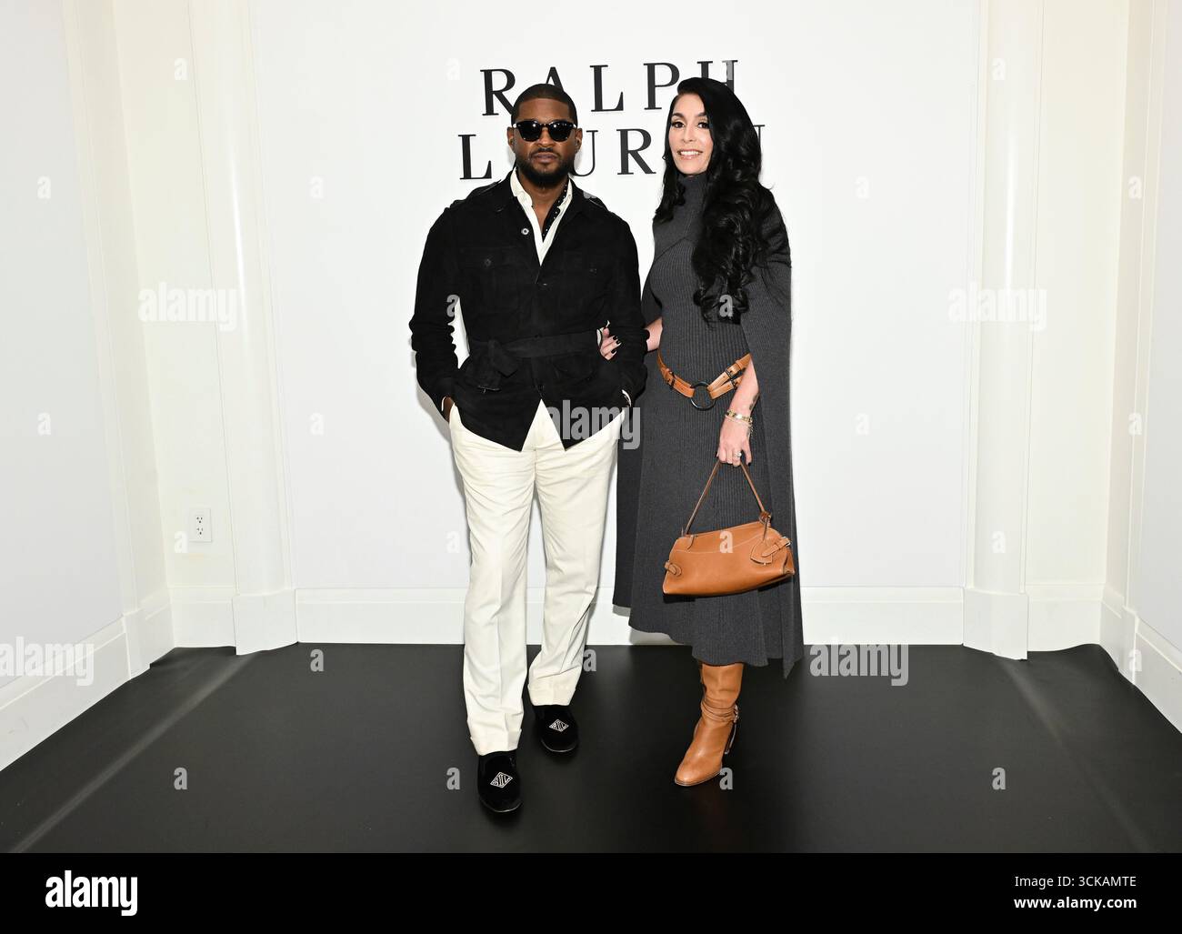 Usher Raymond, left, and Jennifer Goicoechea attend the Ralph Lauren ...