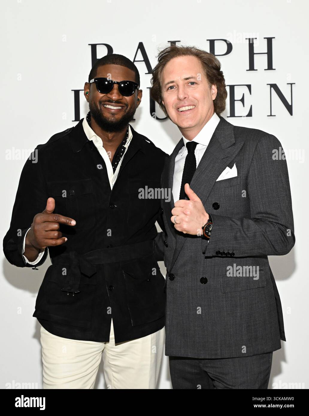 Usher Raymond, left, and David Lauren attend the Ralph Lauren Spring ...