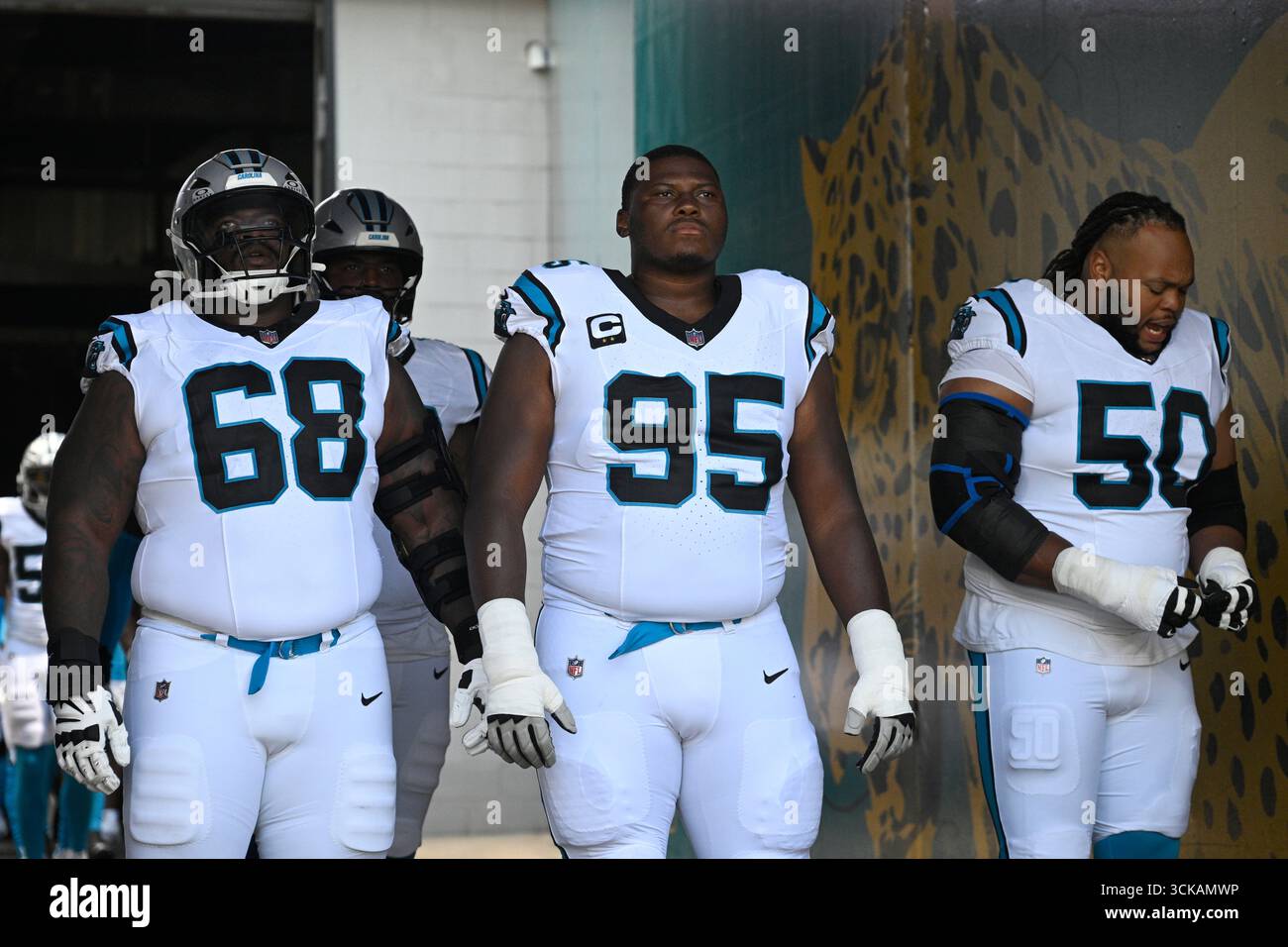 Carolina Panthers guard Damien Lewis (68), defensive end Derrick Brown ...