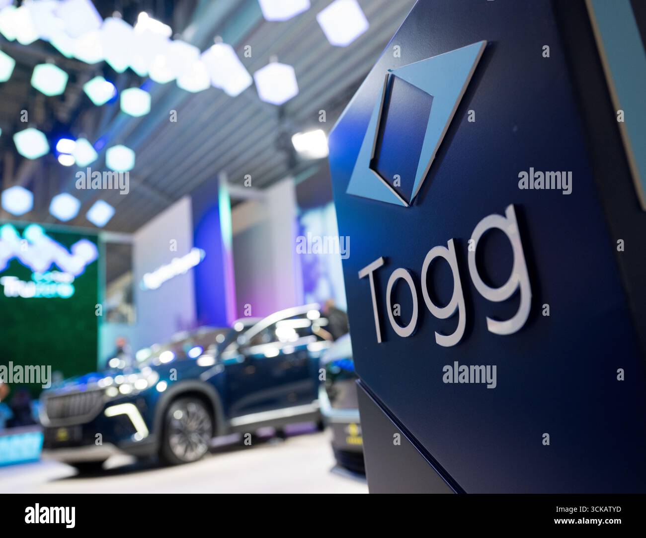 10 September 2025, Bavaria, Munich: The Togg logo and vehicles can be ...